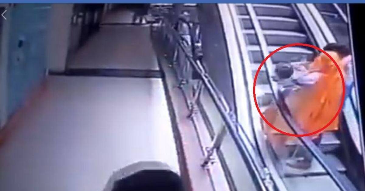 Toddler severely injured after falling off escalator in metro station ...