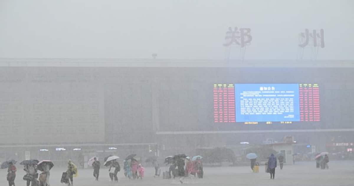 China: Videos of Zhengzhou flood show people stuck in trains, malls in ...