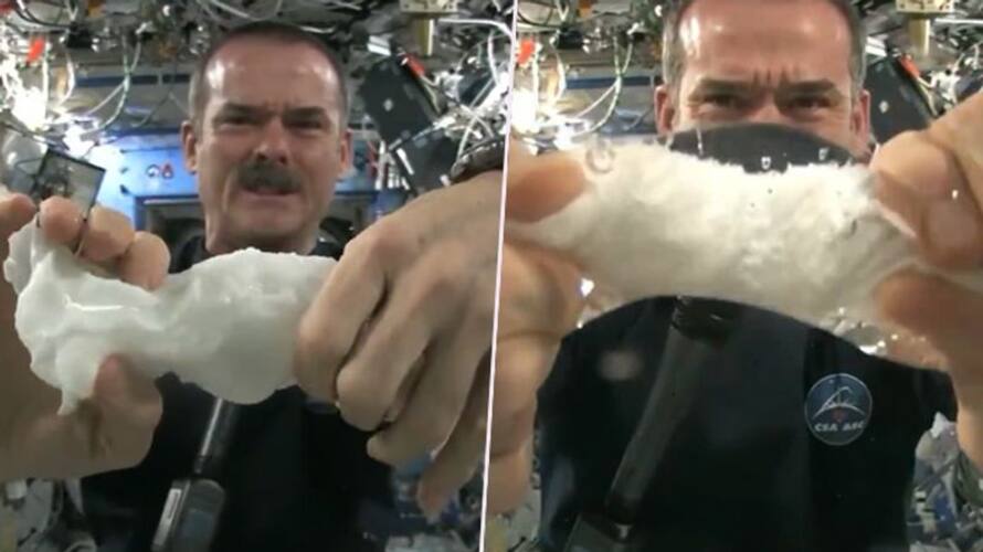 Astronaut demonstrates the result of squeezing a wet towel in space ...