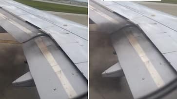 United Airlines flight engine catches fire moments before takeoff at ...