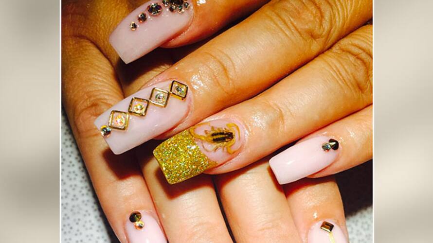 Gluing dead scorpions to nails is the latest trend in nail art